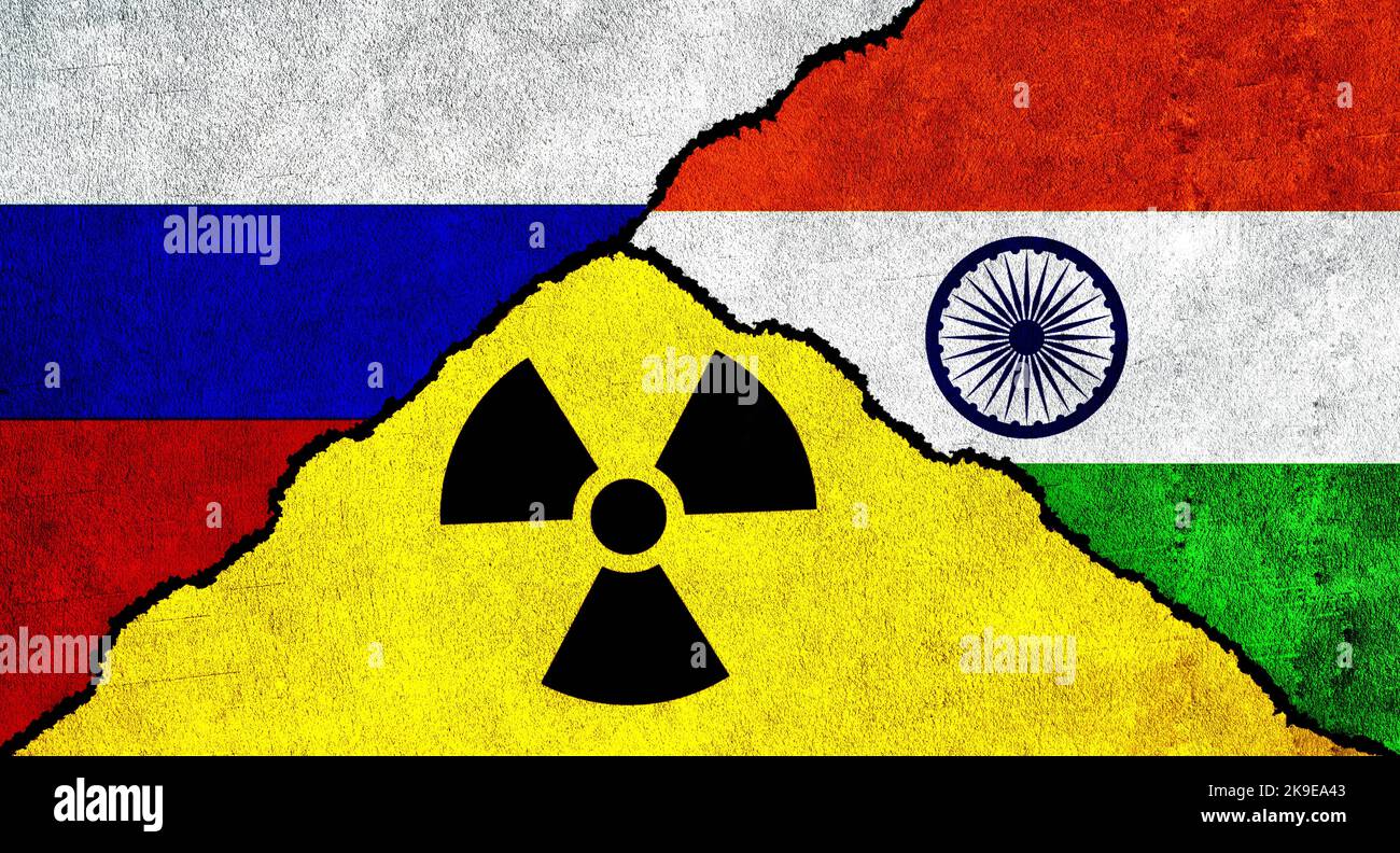 Flags of Russia, India and Nuclear symbol together on textured wall ...