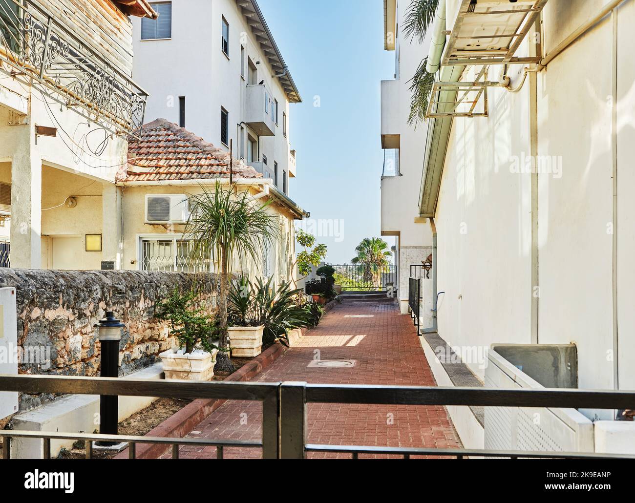 Nice Israeli courtyard with Mediterranean-style residential buildings ...