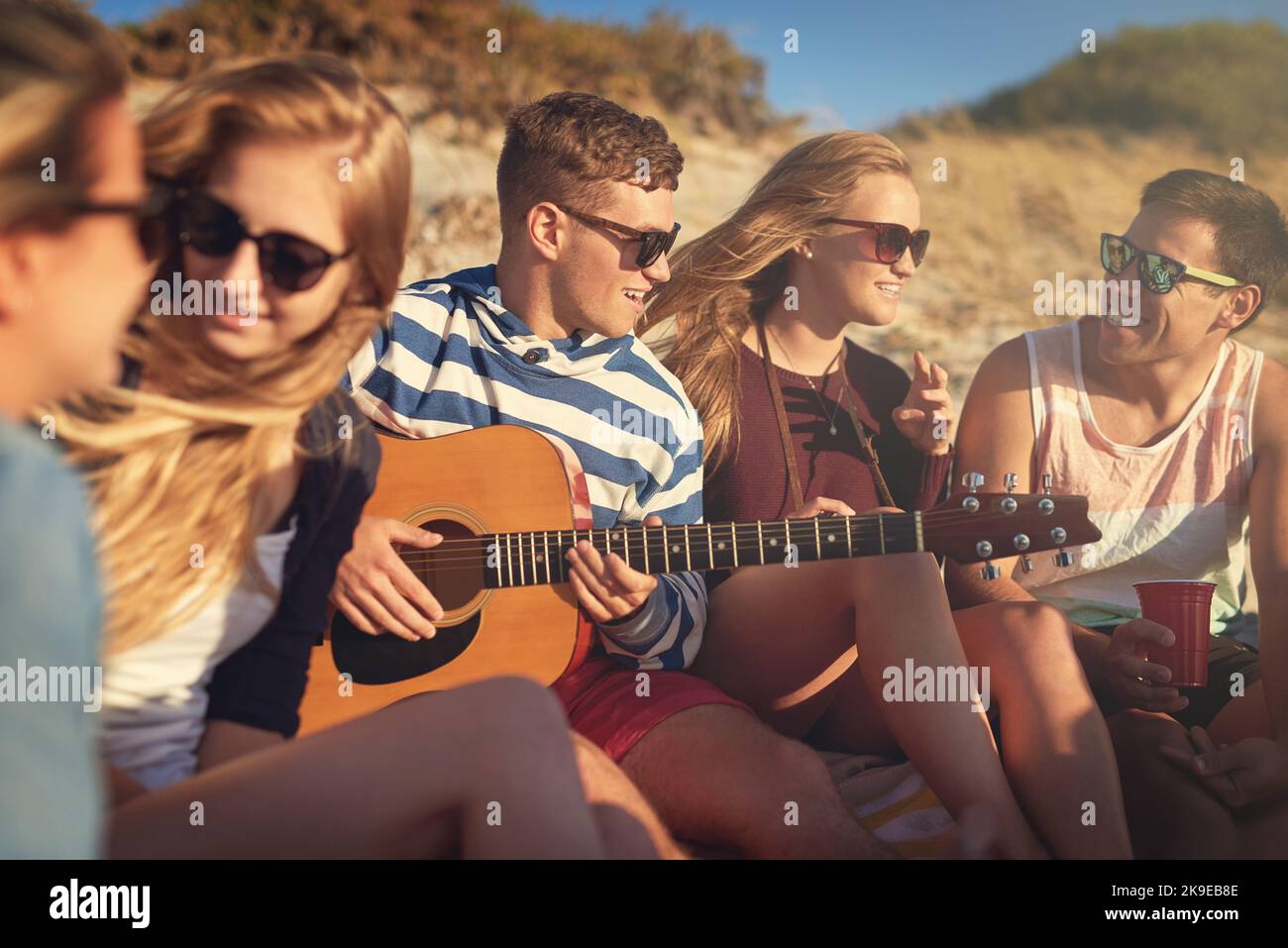 Great memories with great friends. a group of young friends hanging out ...
