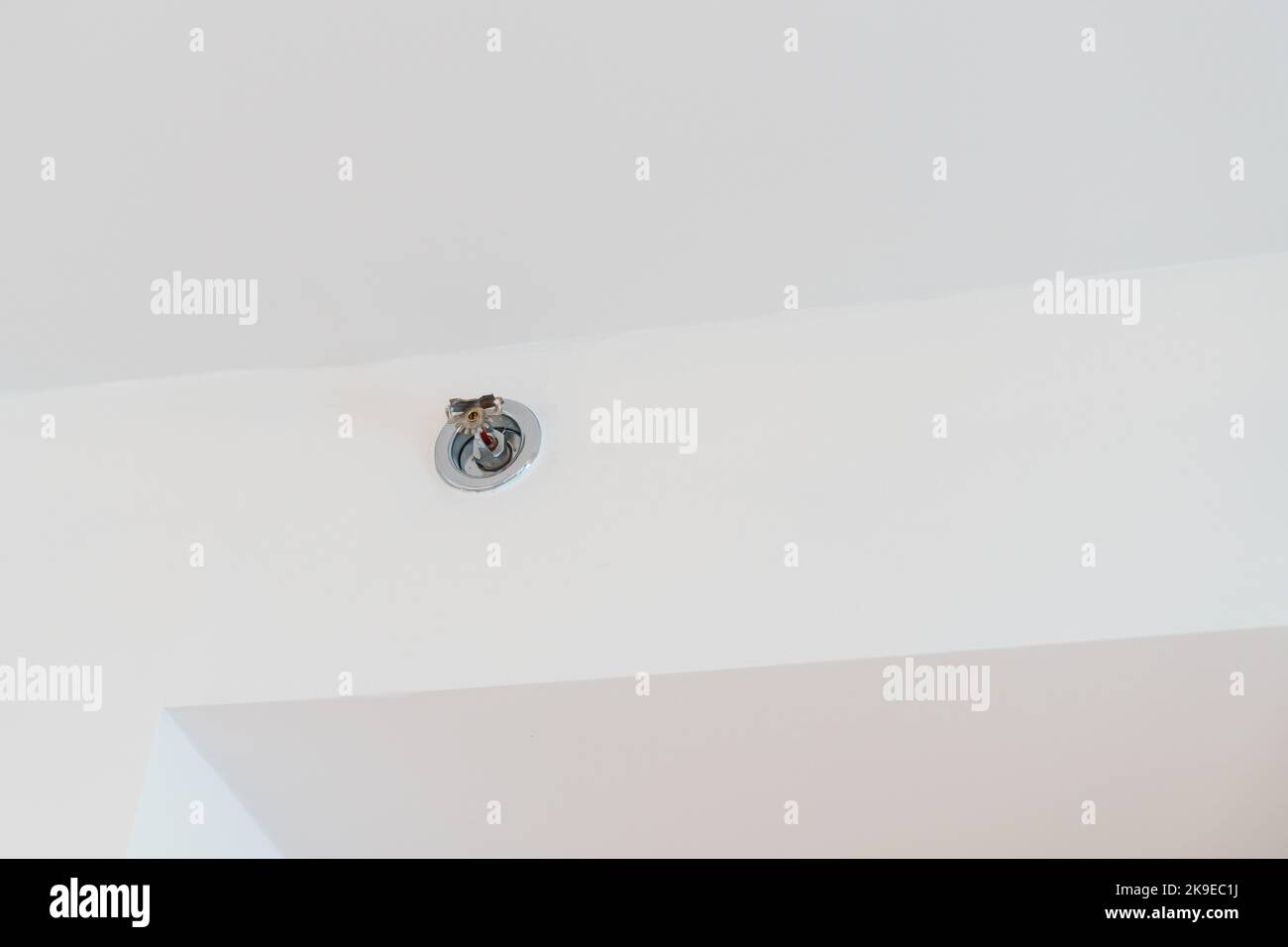 Fire Sprinkler detector mounted on roof in home or apartment. Safety ...