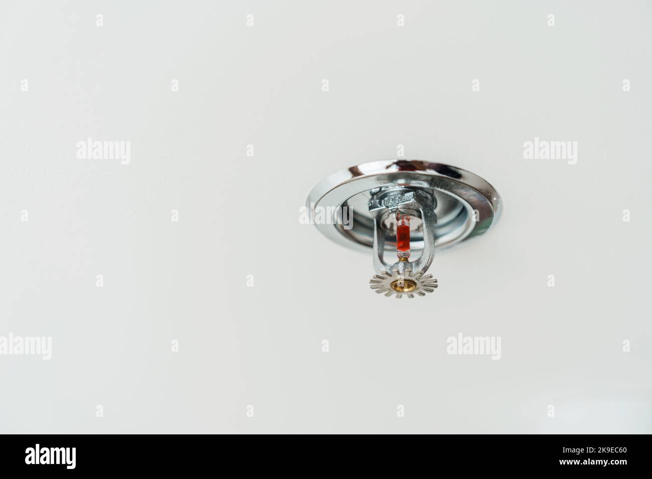 Fire Sprinkler detector mounted on roof in home or apartment. Safety ...
