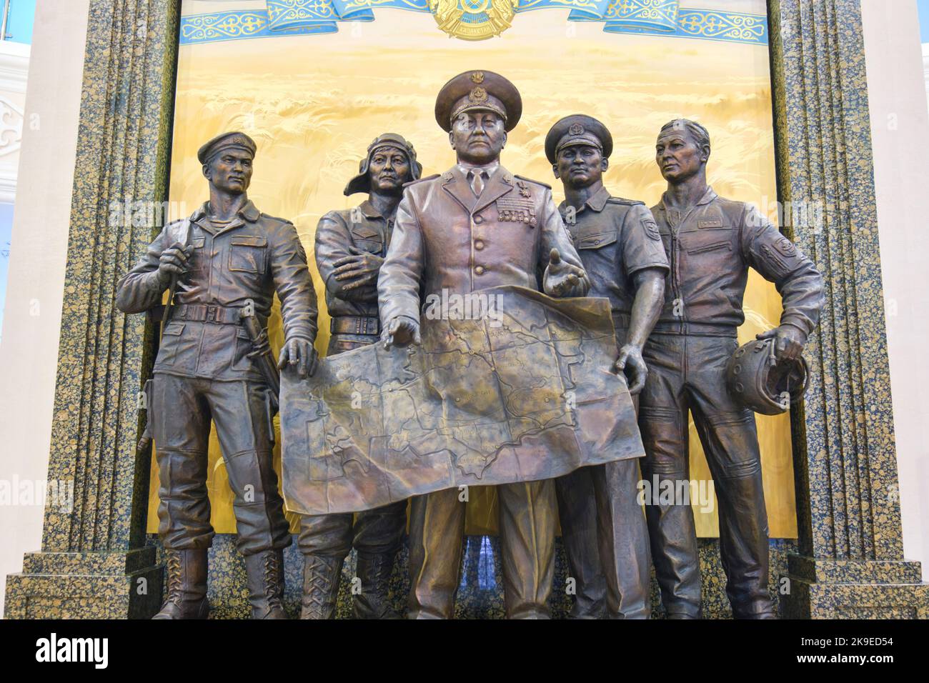 A bronze statue, sculpture of a group of military commanders with a map ...