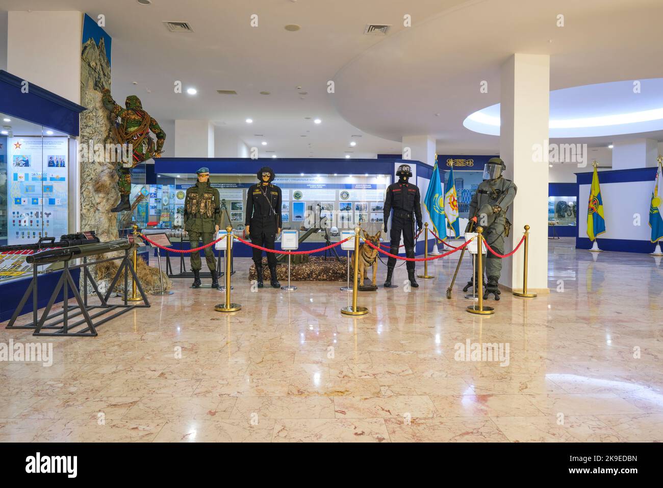 A room, gallery with a display, exhibit of military uniforms and other objects. At the Military ...