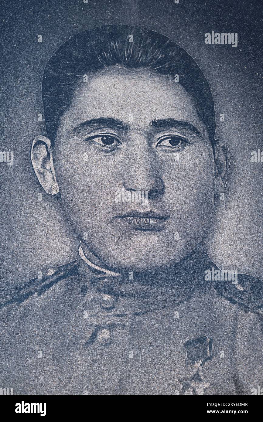 An example of one of the fallen men, etched in black granite on the ...