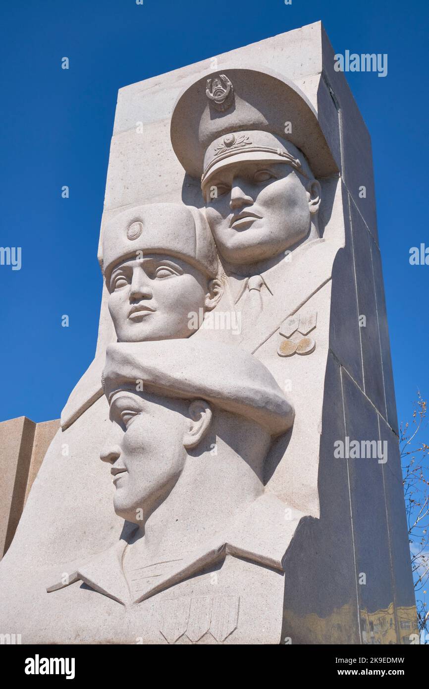 Detailed view of some of the stone, carved heads of fallen men. At the ...
