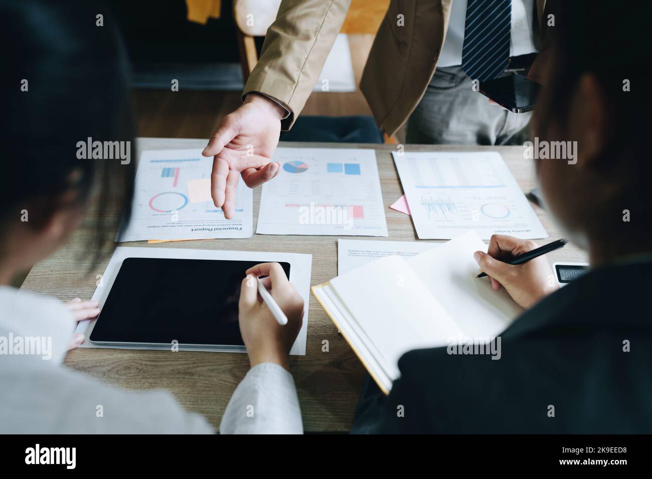 Asian entrepreneurs and business people meeting in a conference room in ...