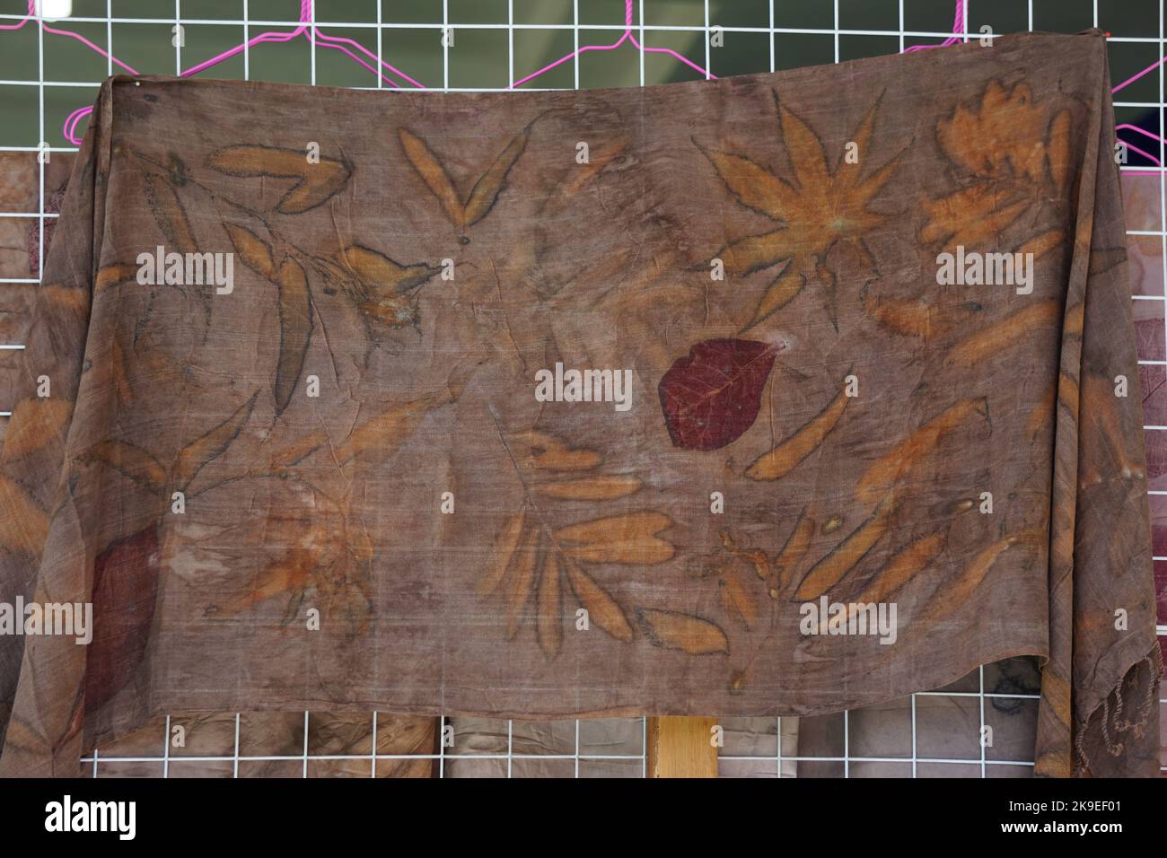 Beautiful batik fabric hanging on the wall. Batik is one of Indonesian ...