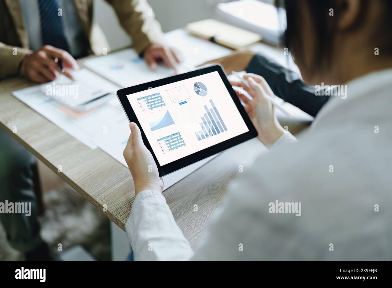 Asian entrepreneurs and business people meeting in a conference room in ...