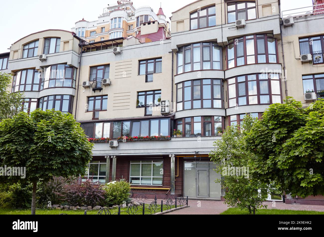 Modern apartment buildings on a sunny day with a blue sky. Facade of a ...