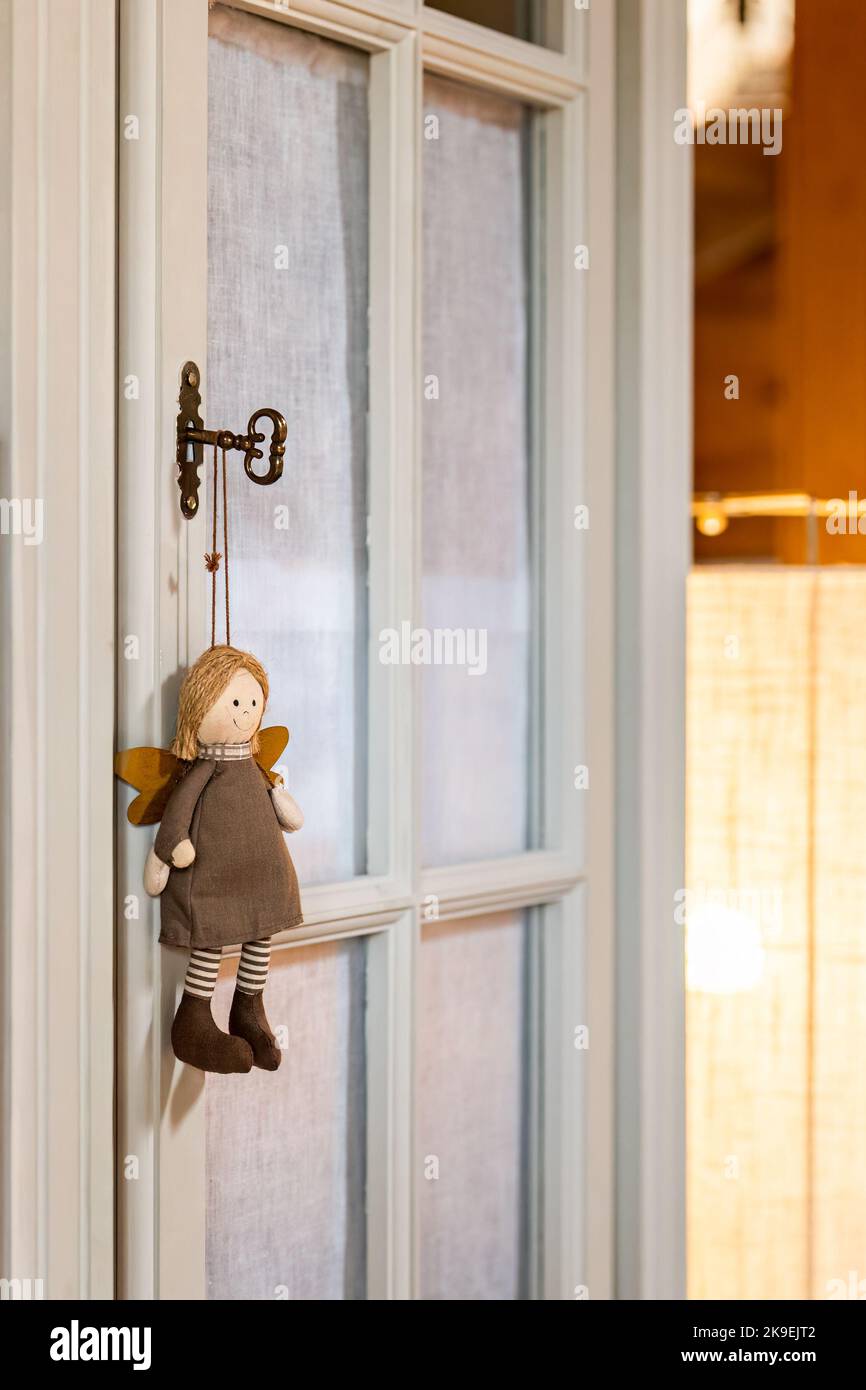 Beautiful handmade rag doll with butterfly wings hanging on a key of ...