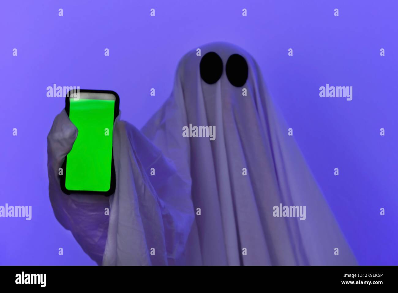 The ghost shows a phone with a green screen. Phone with chromakey. The ...