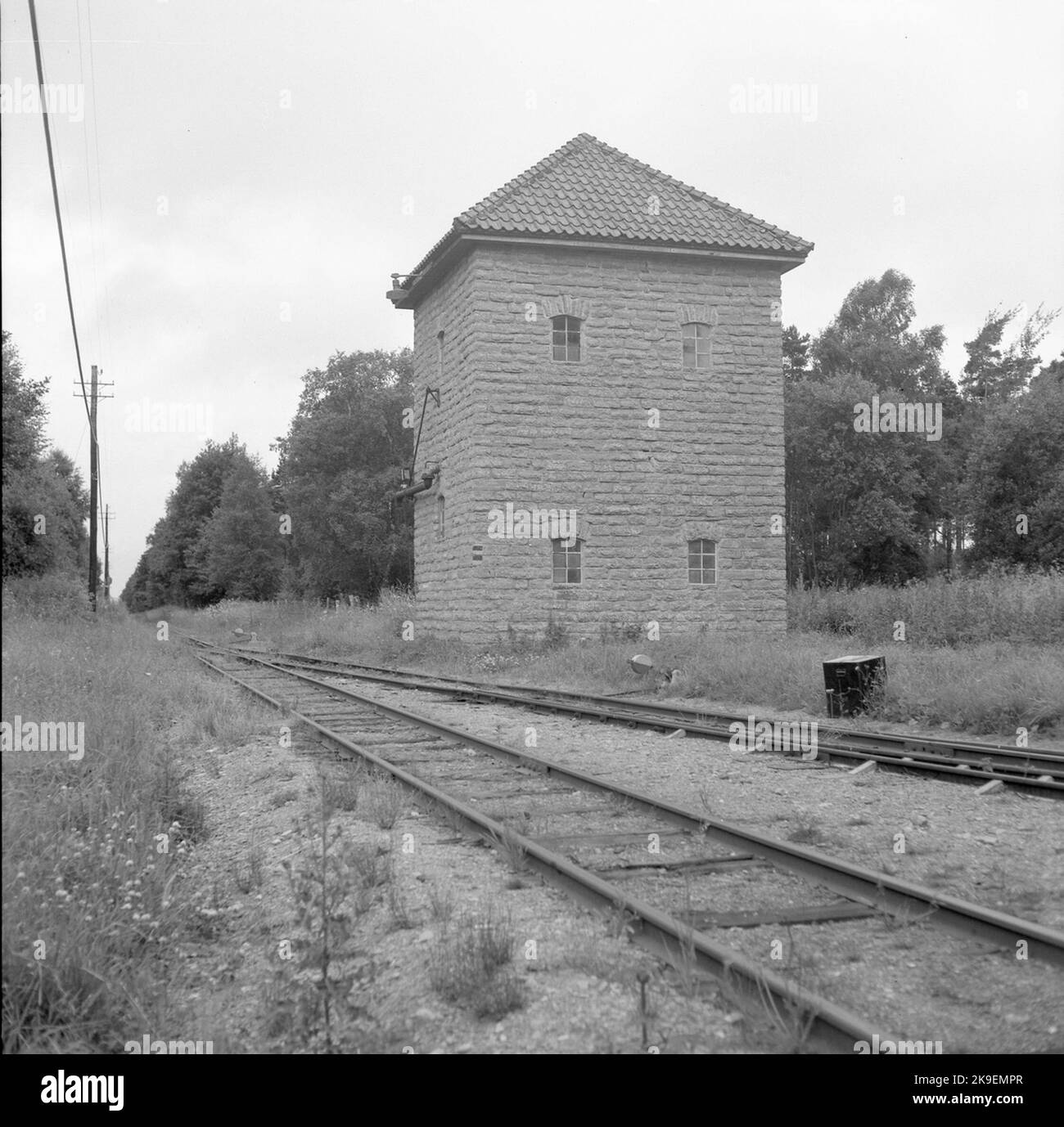 Water tower built with masonry stone Stock Photo - Alamy