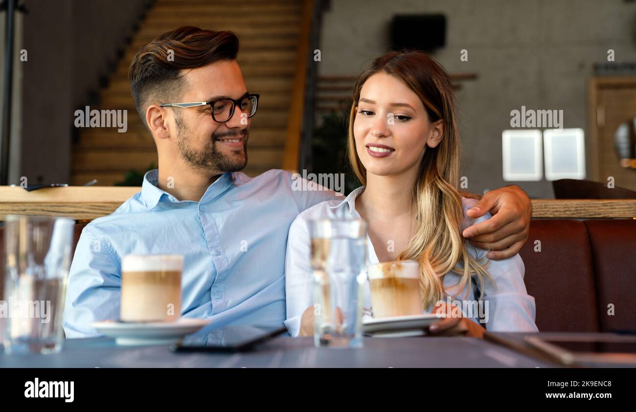 Sad woman does not feel good in her relationship on a date. Couple ...