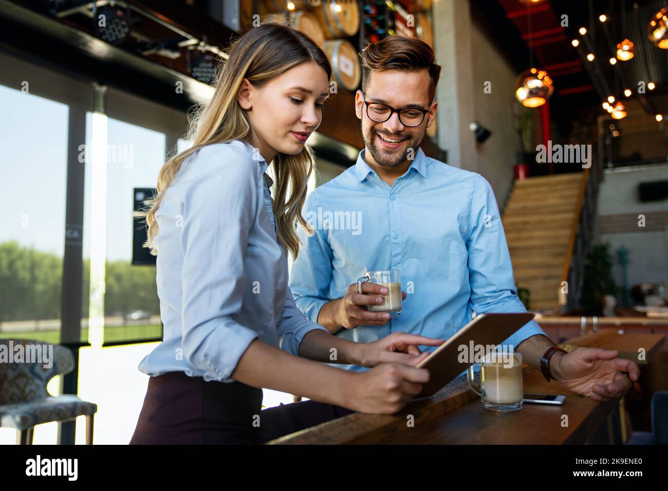 Business people having fun and chatting at workplace office Stock Photo ...