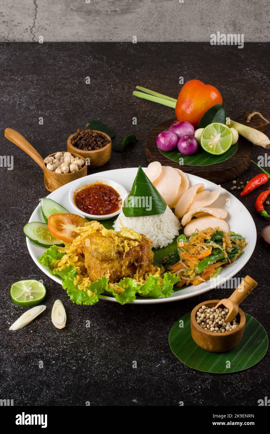 Ayam Goreng Lengkuas or spices fried chicken is a traditional ...