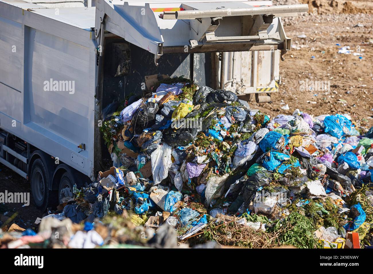 Truck unloading garbage on an open air dump. Waste recycling Stock ...