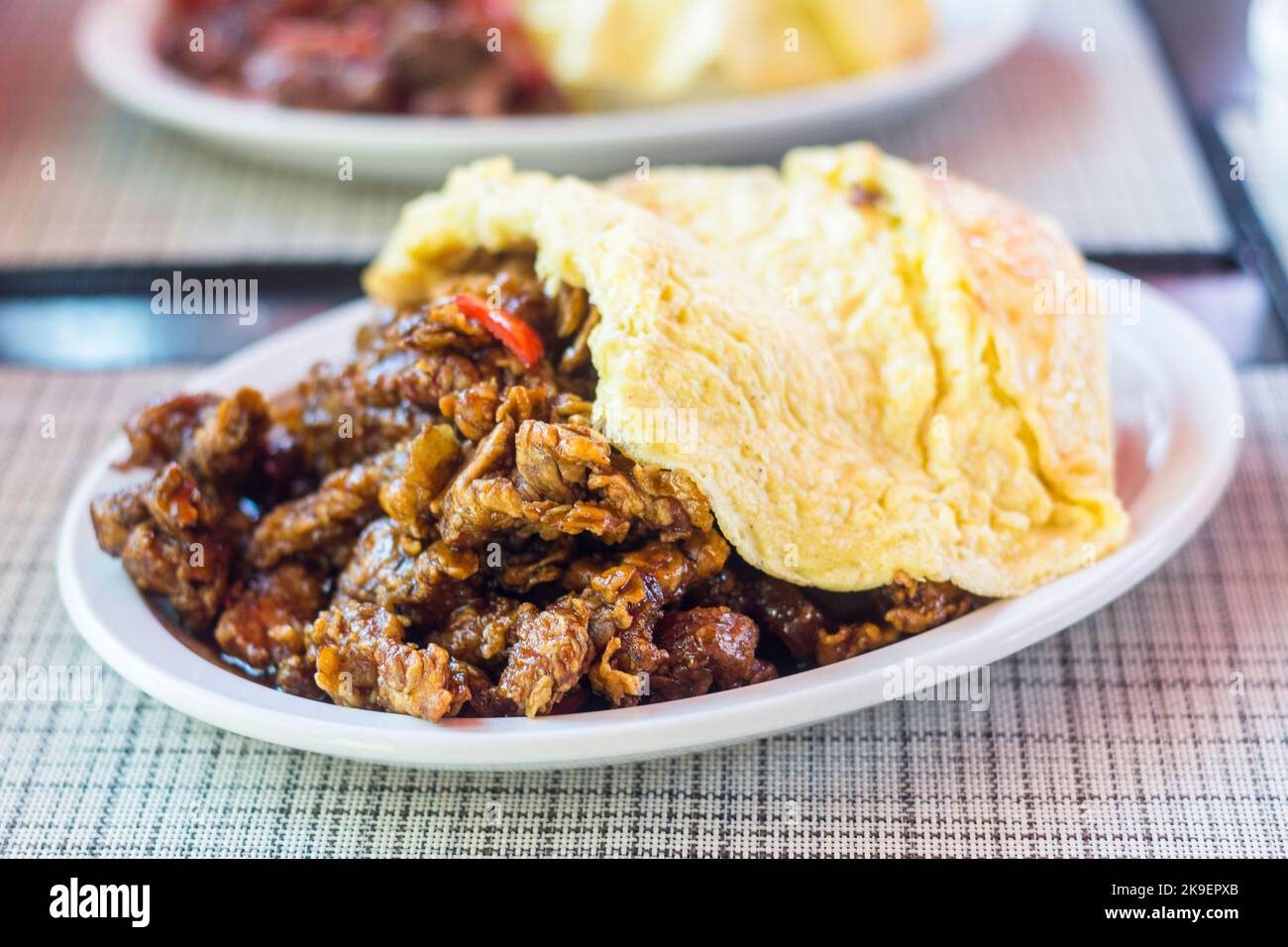 Tapsilog, a popular Filipino rice dish with sauteed beef and egg in ...