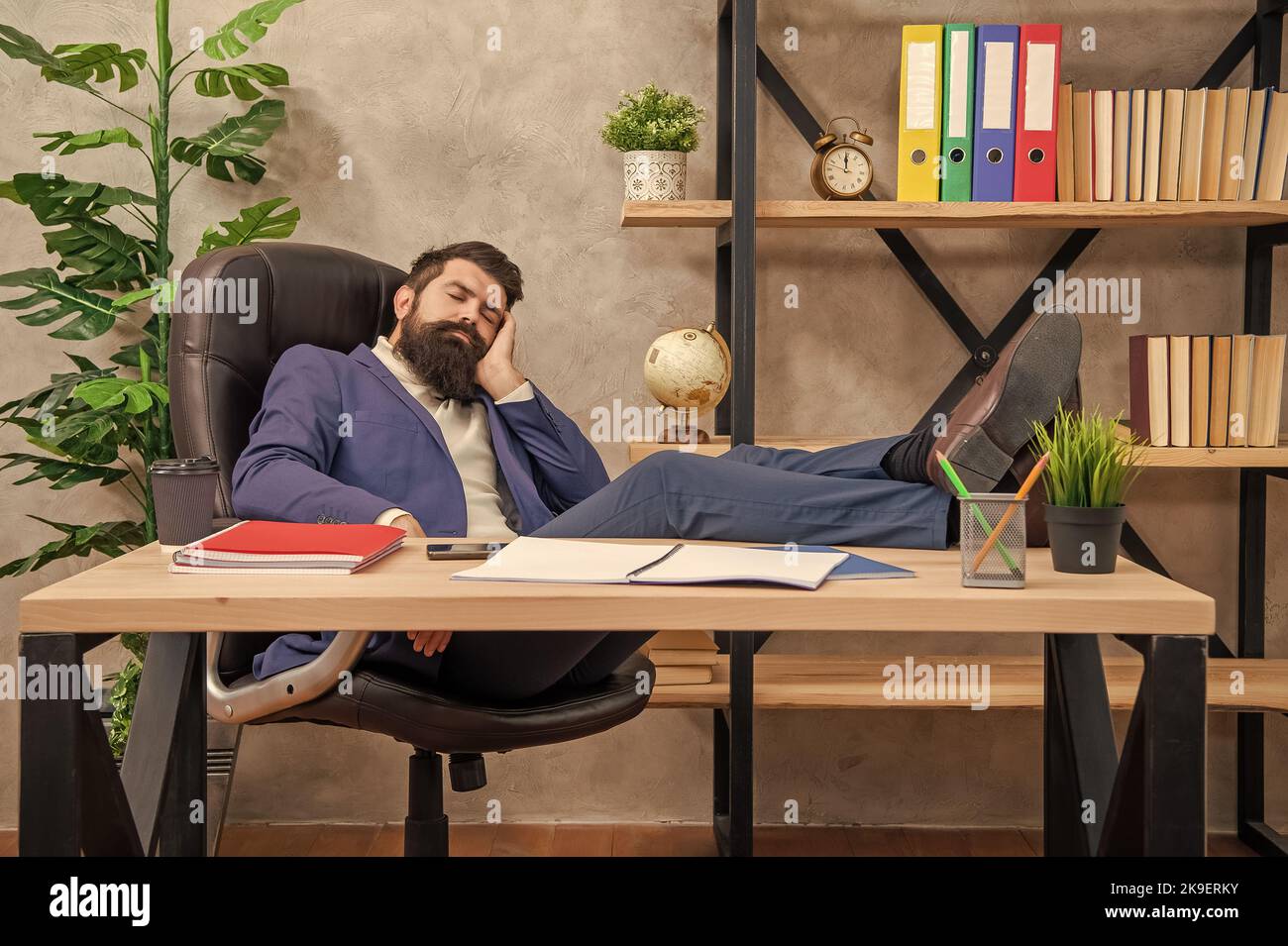 Tired manager napping with legs on desk during work rest in office, nap ...