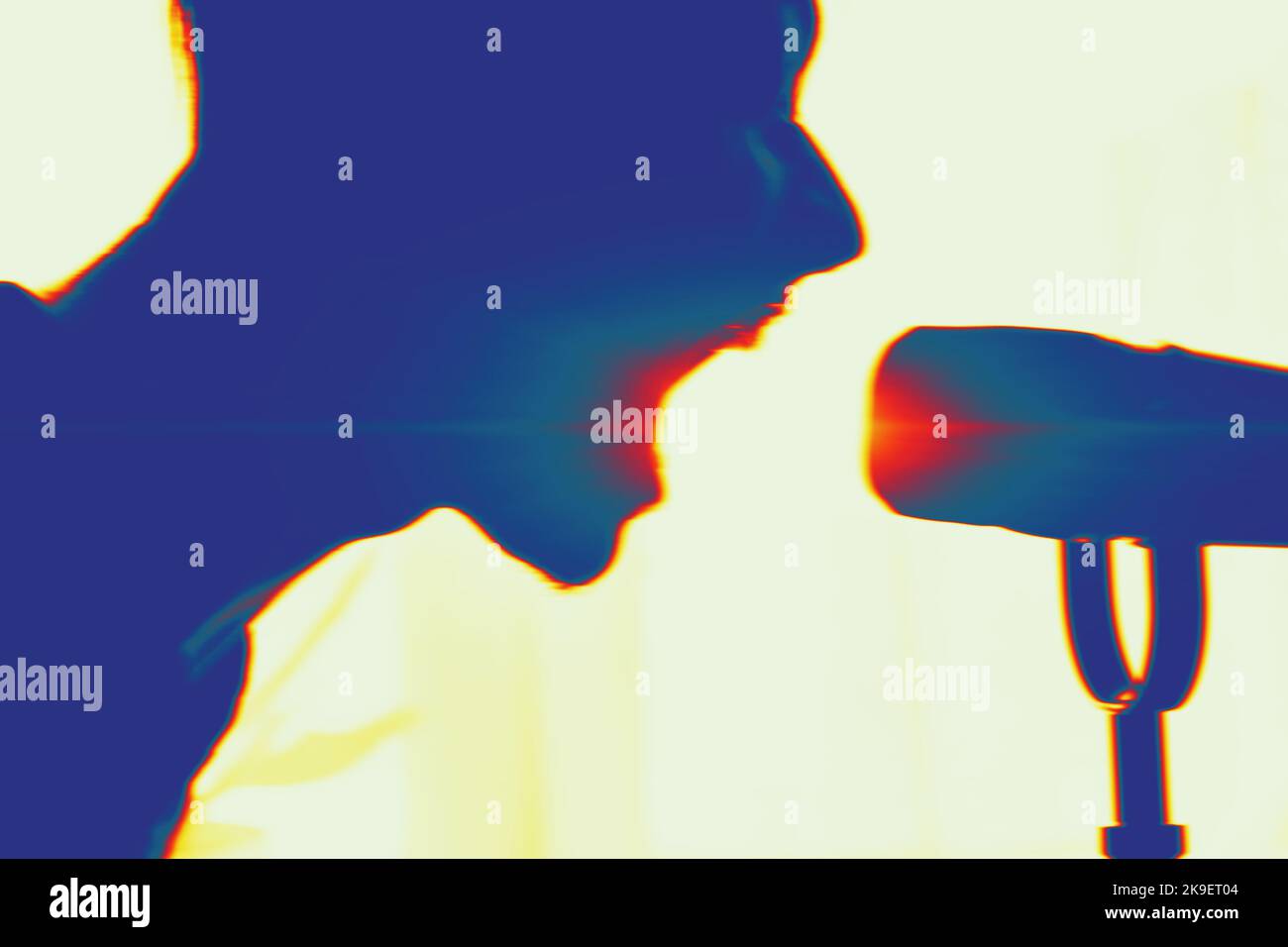 One person sings into the microphone for a copy space. Silhouette of a ...