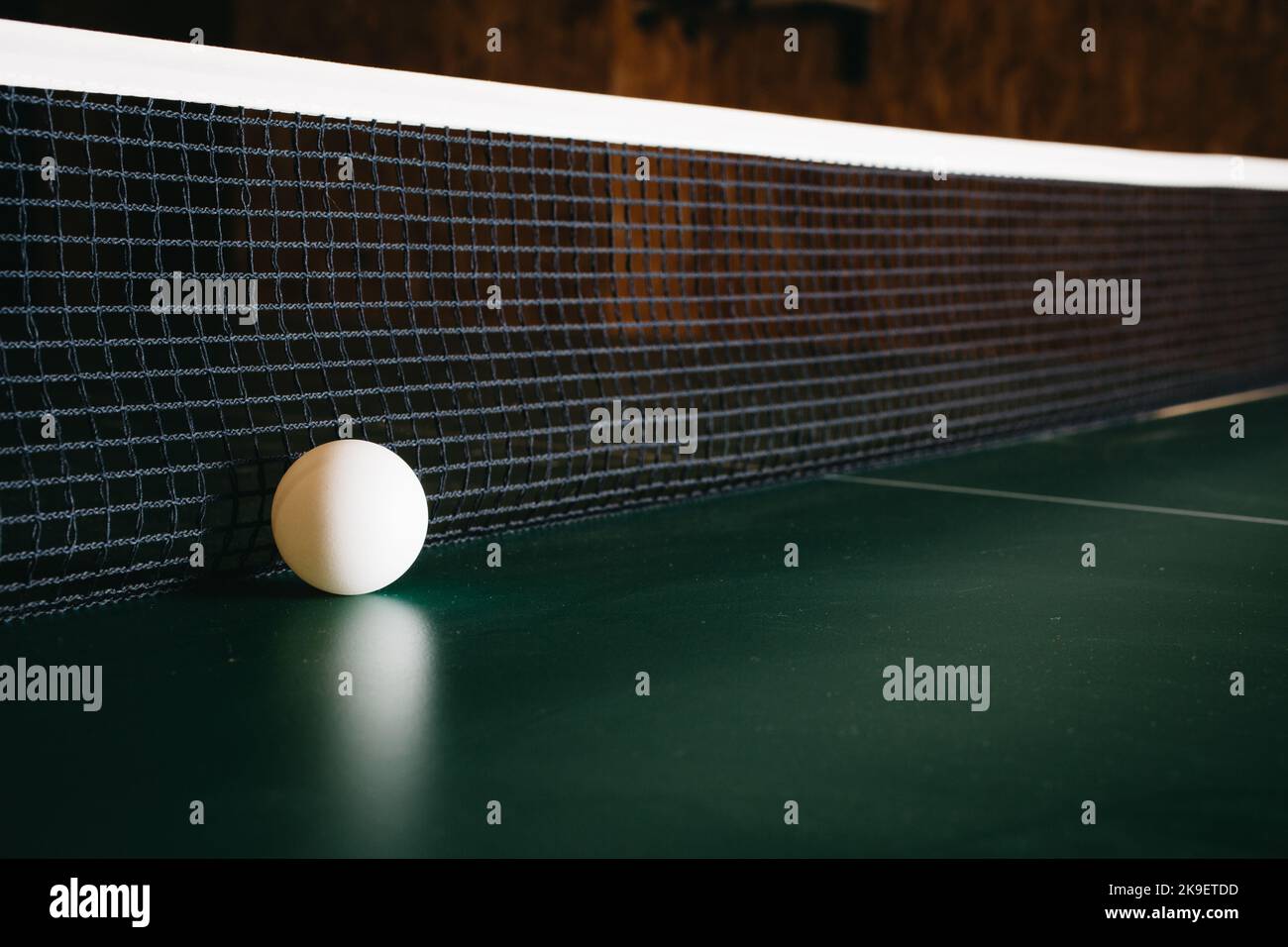 Ping pong ball are on the green game table Stock Photo - Alamy