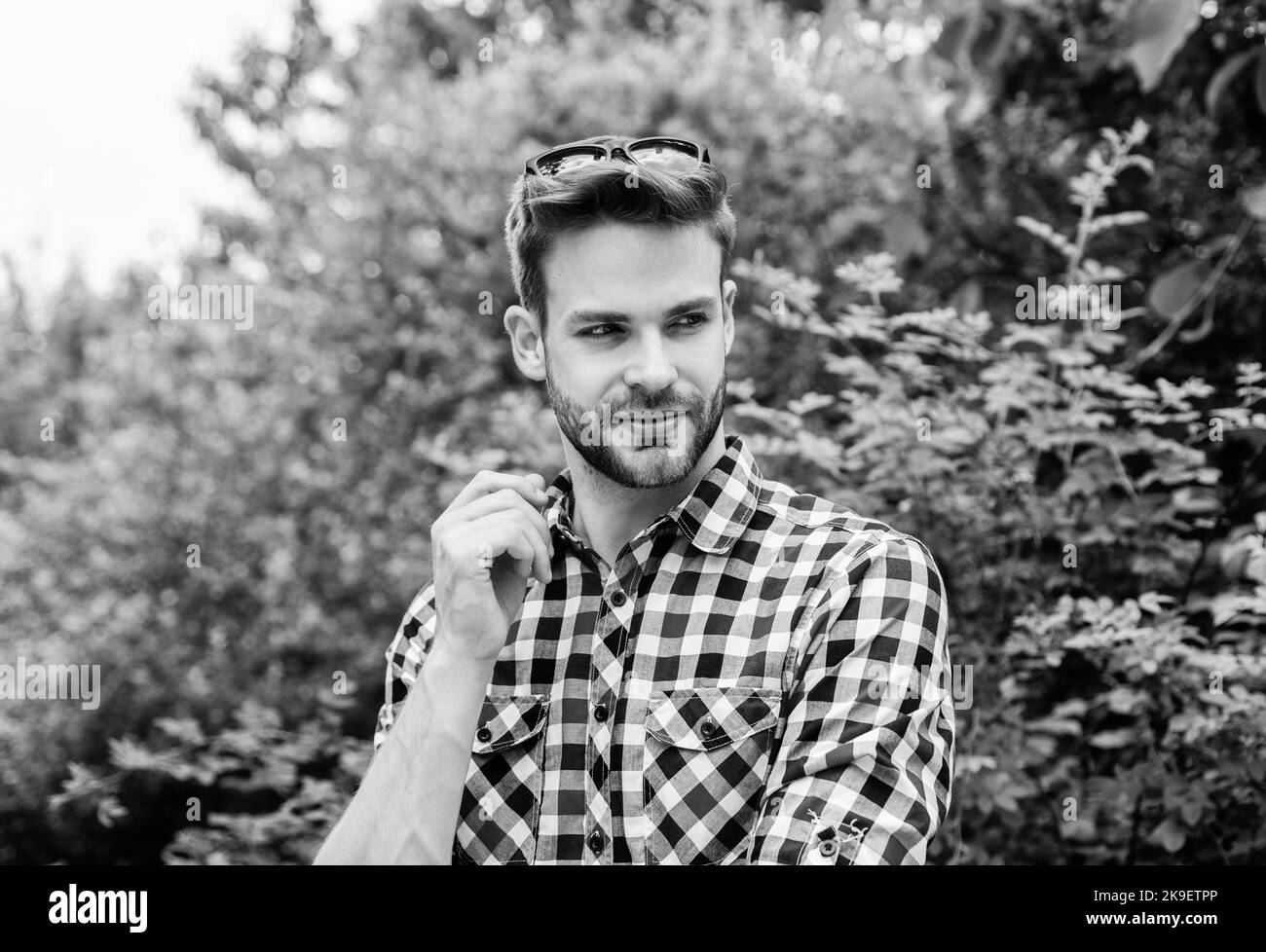 handsome young man in checkered shirt outdoor, male fashion Stock Photo ...