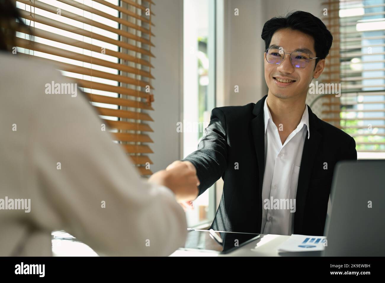 Asian female advisor talking hi-res stock photography and images - Alamy