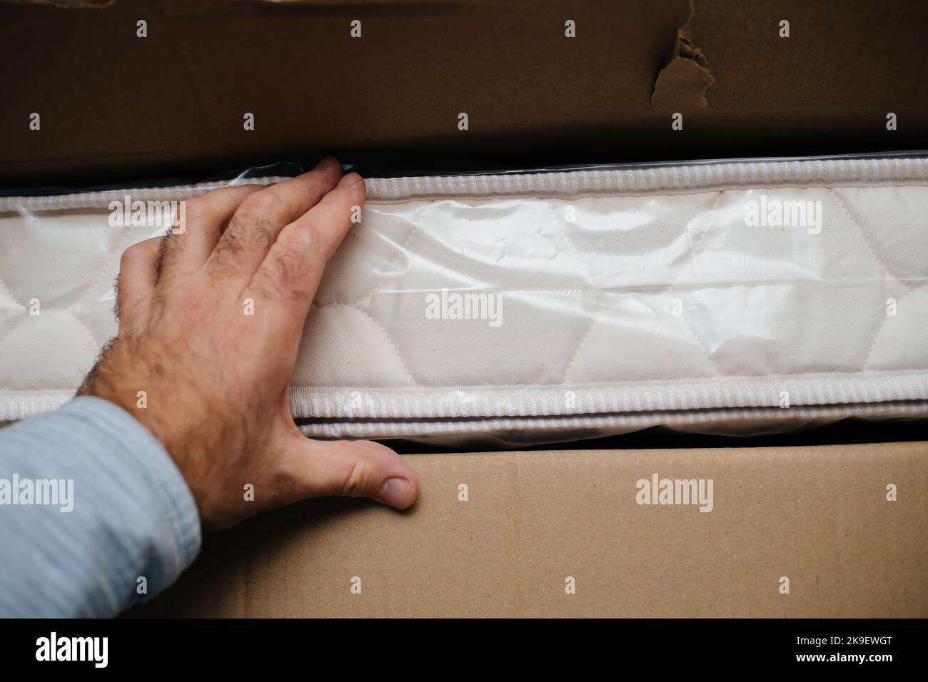 Unboxing mattress hi-res stock photography and images - Alamy