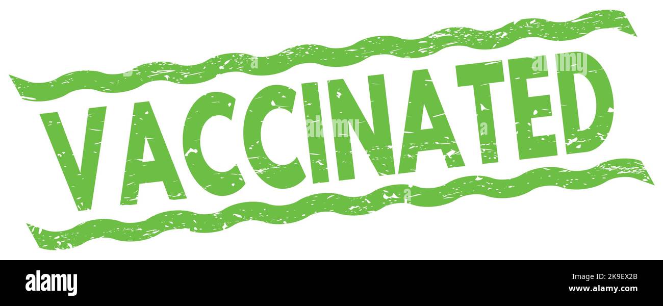 VACCINATED text written on green lines stamp sign Stock Photo - Alamy