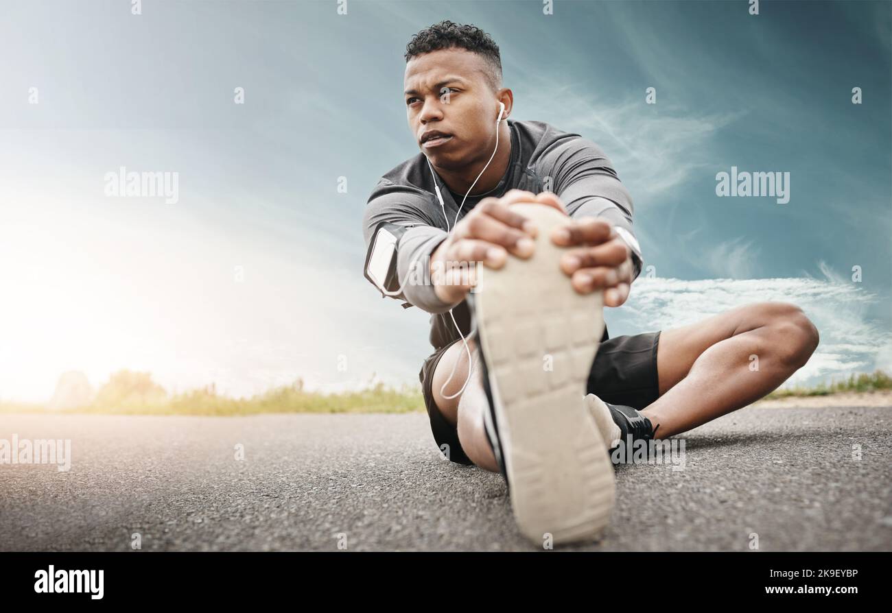 Those muscles are getting warmer. a sporty young man exercising ...