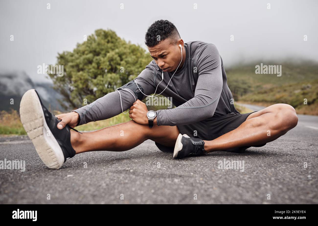 Keep pushing your limits. a sporty young man exercising outdoors Stock ...