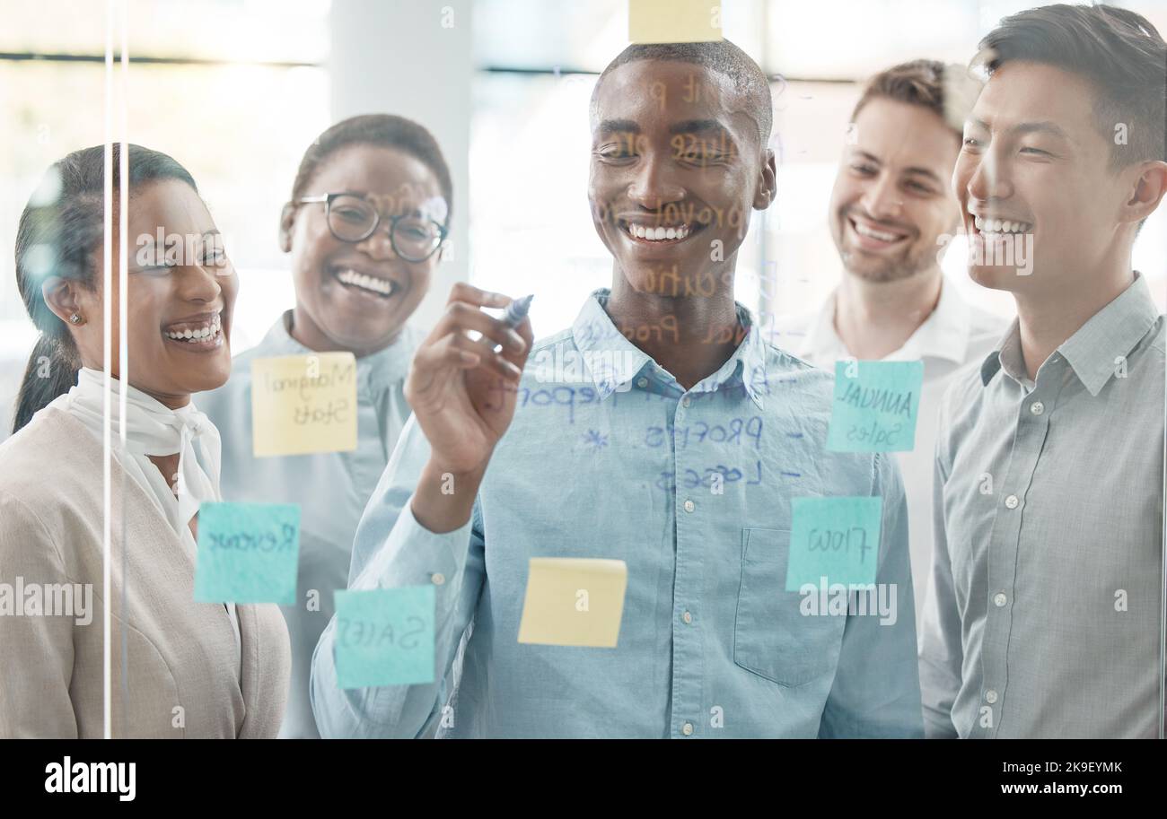 Planning, teamwork and sticky note with business people in meeting for ...