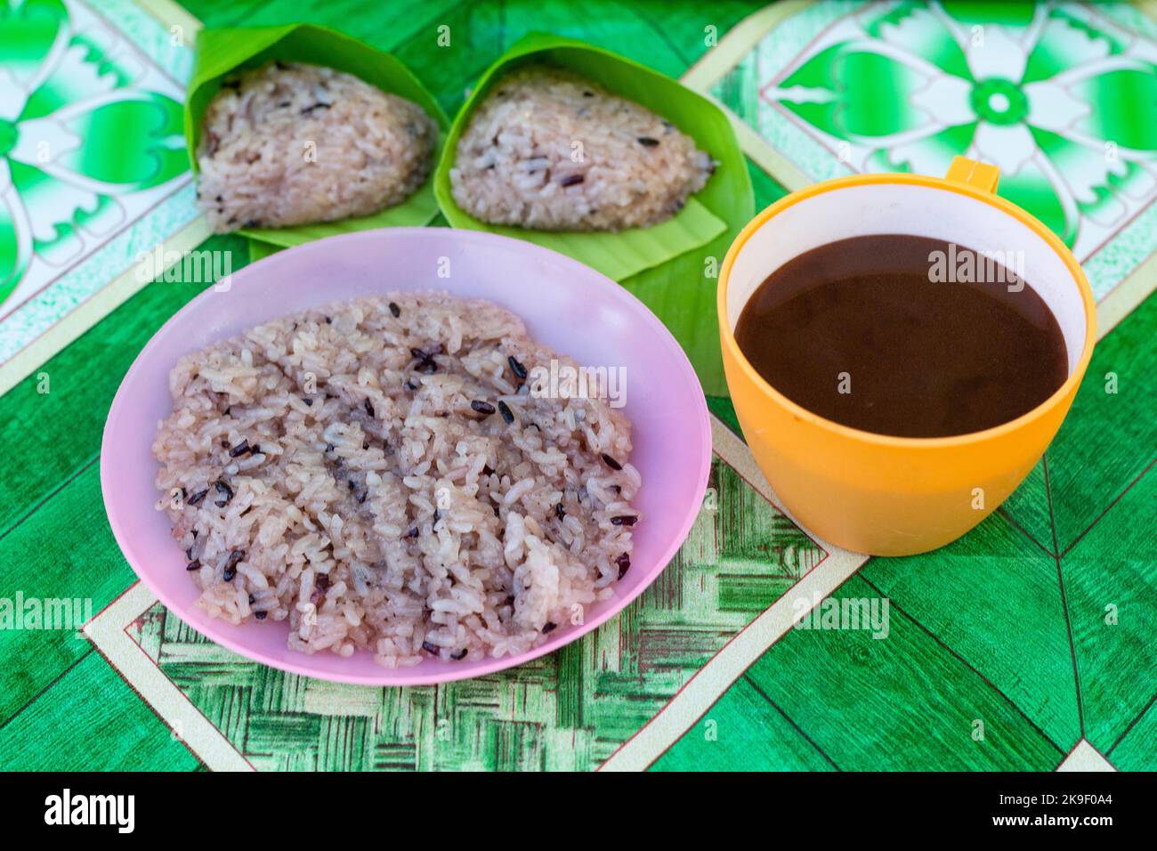 Filipino rice cake and hot chocolate at a roadside eatery in Cebu ...
