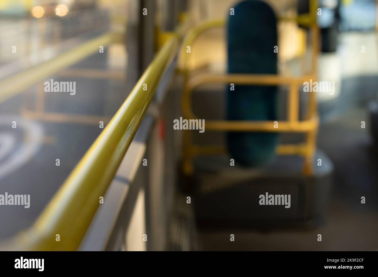 Handrail in bus. Yellow handrail. Interior of public transport. Empty ...