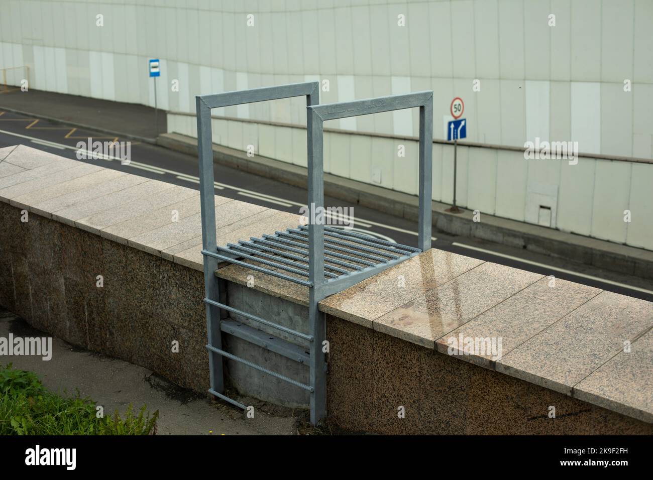 Stairs down wall. Steel staircase on bridge. Infrastructure details ...