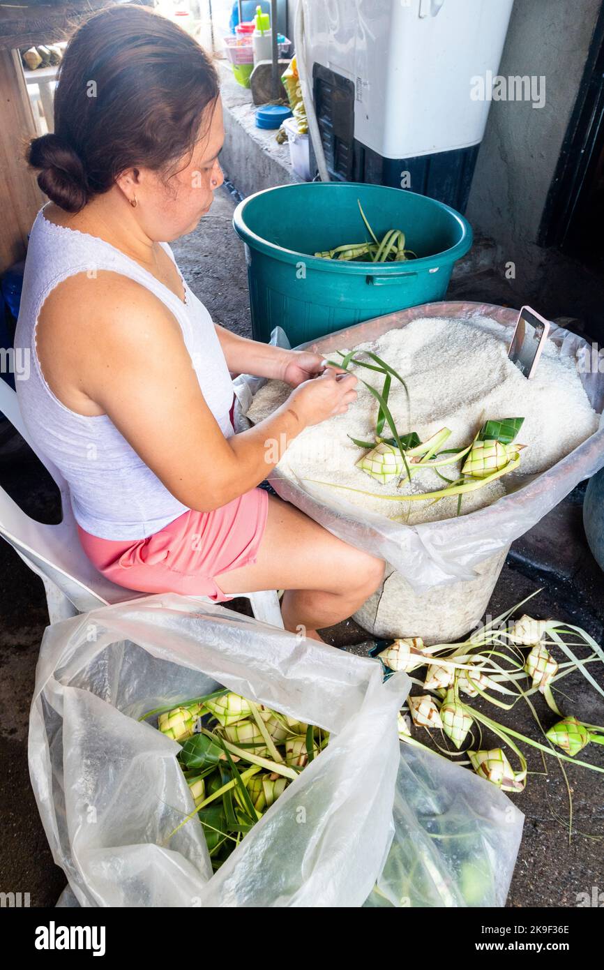 Making hanging rice popularly called puso is a staple in Cebu ...