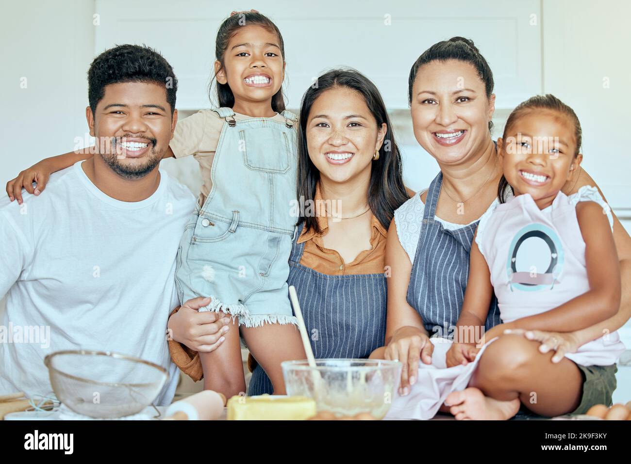 Family, generations and baking, happy in the kitchen, together and ...
