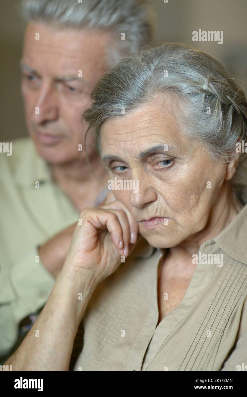 Portrait of a elderly couple being sad together Stock Photo - Alamy