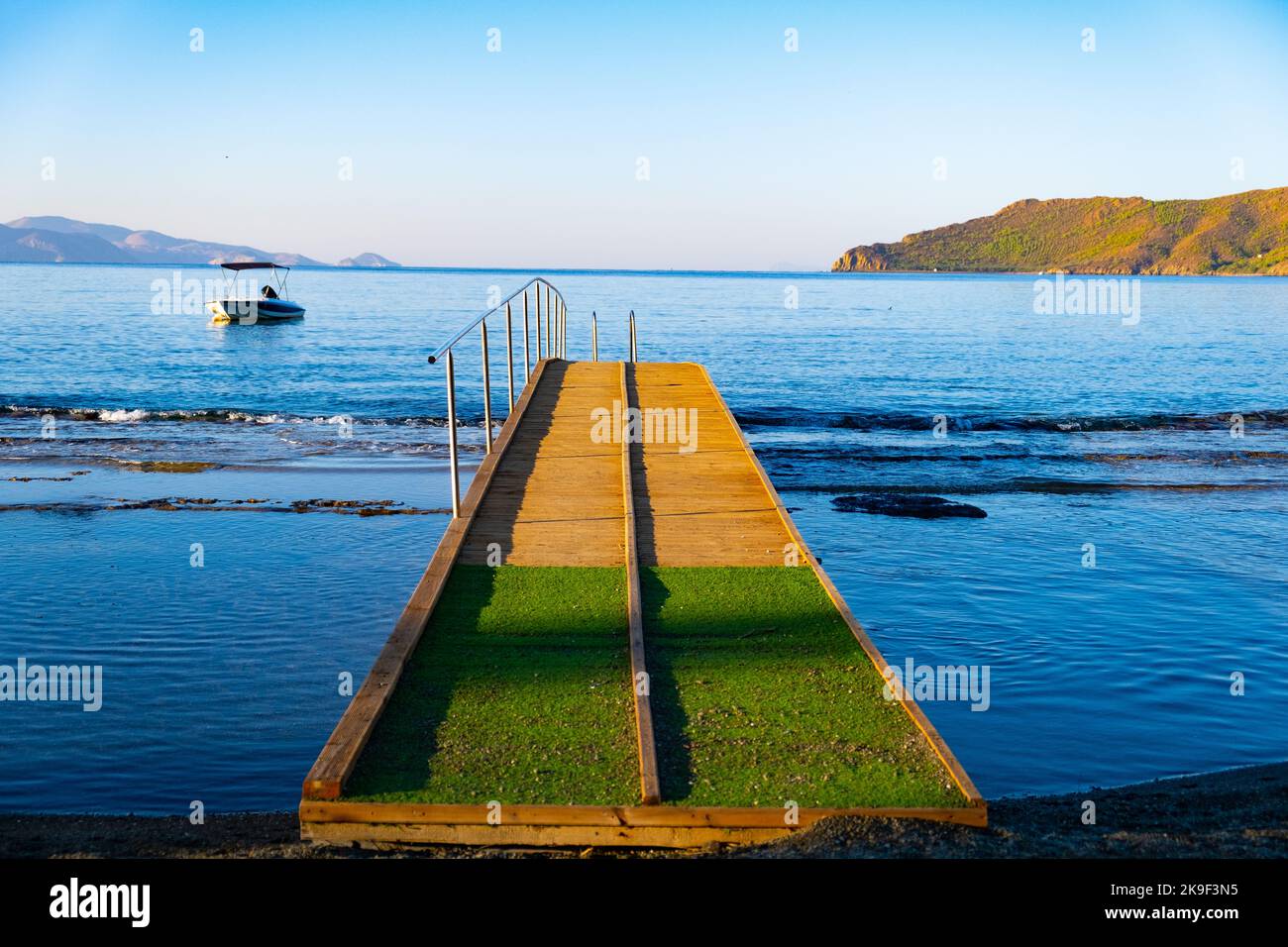 Small wooden pier to enter the sea, Concept idea of small wooden pier ...