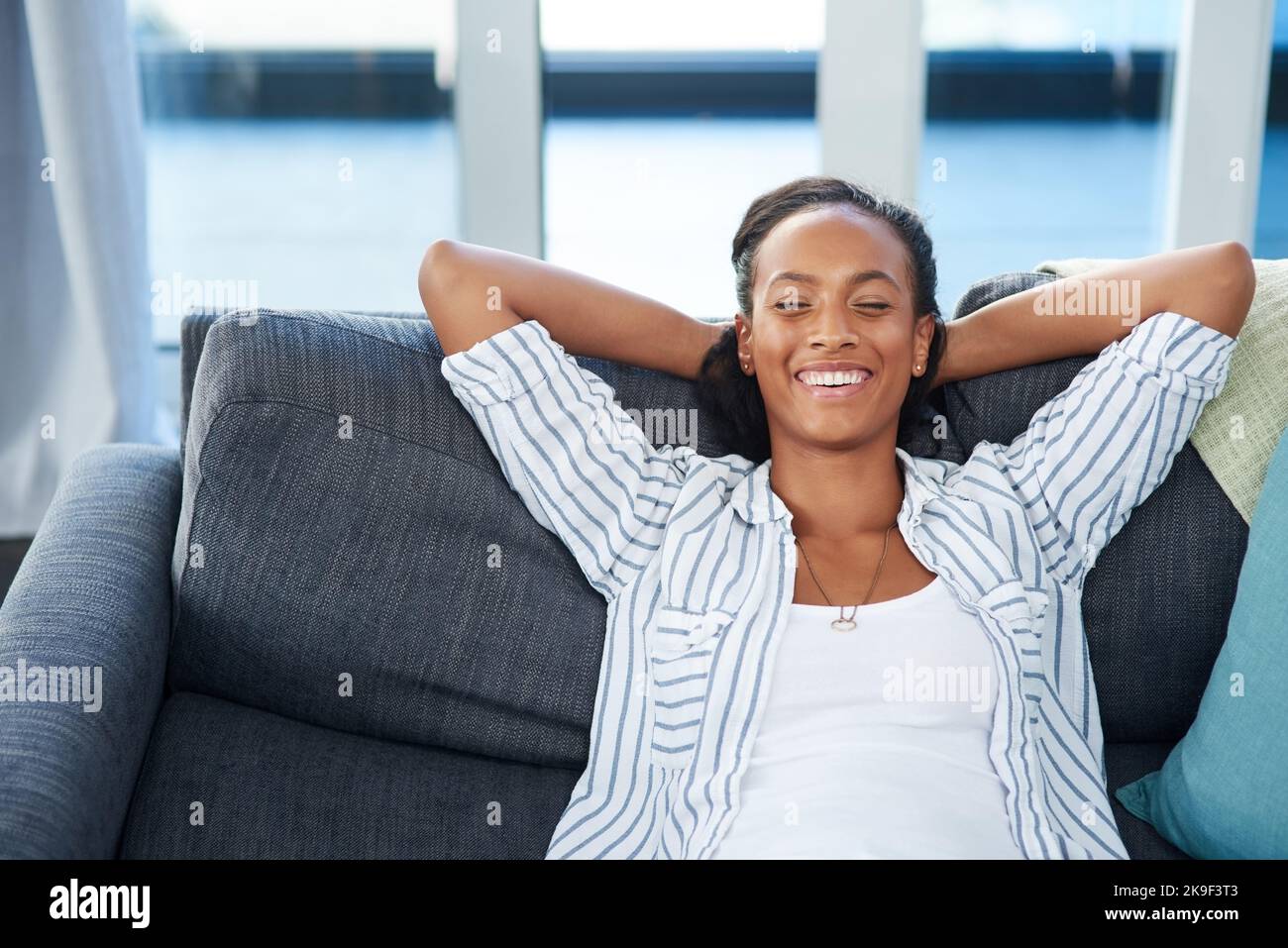 Please do not disturb me this weekend. a young woman relaxing on the ...