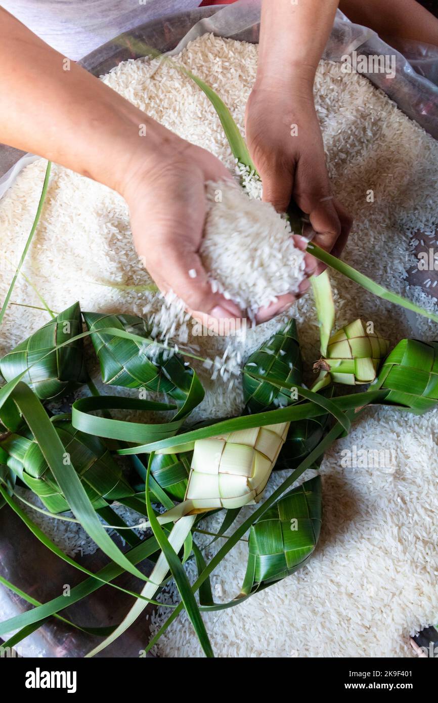 Making hanging rice popularly called puso is a staple in Cebu ...