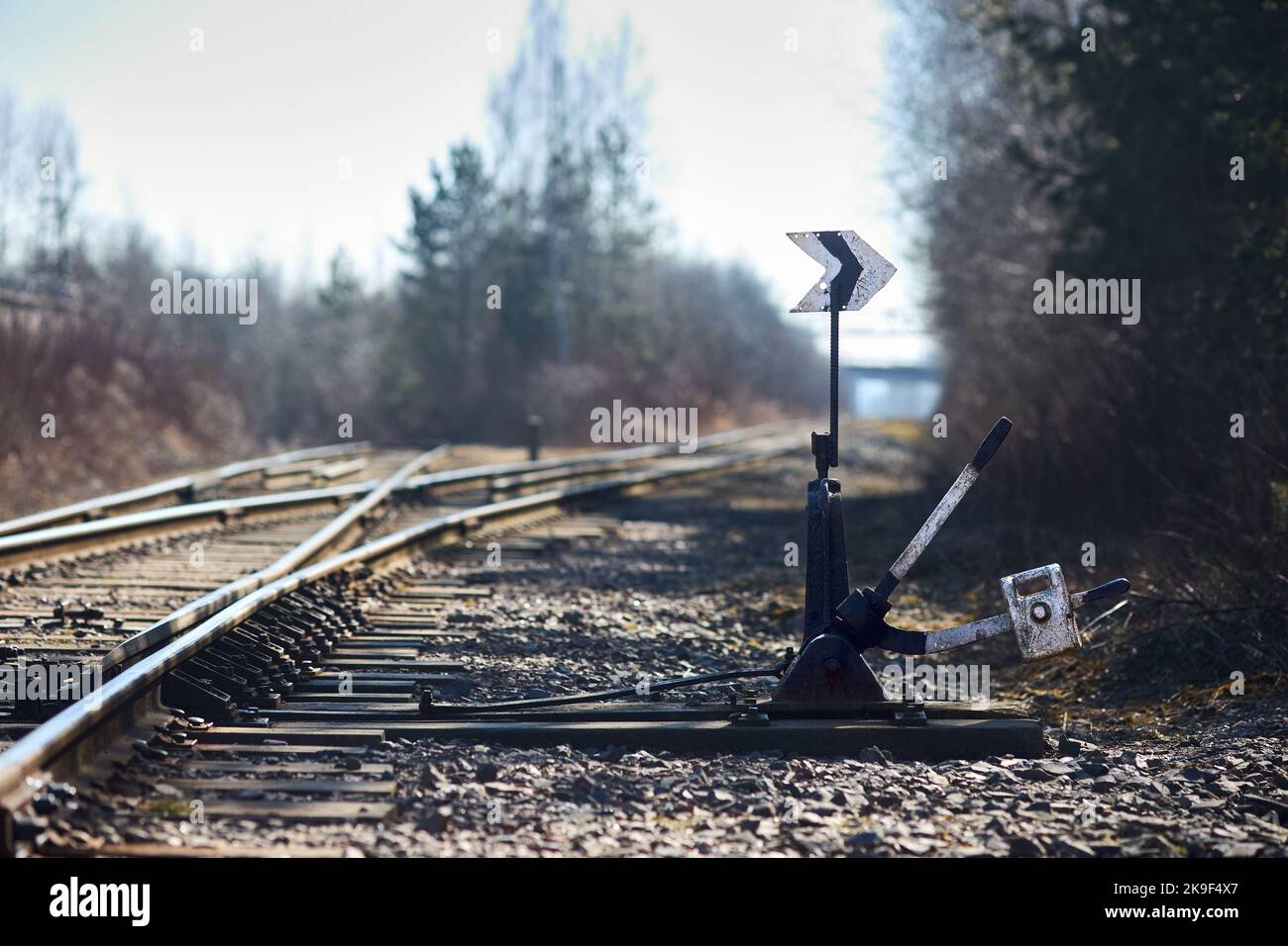 Hand-operated railroad switch with lever signal weight. Old railroad ...