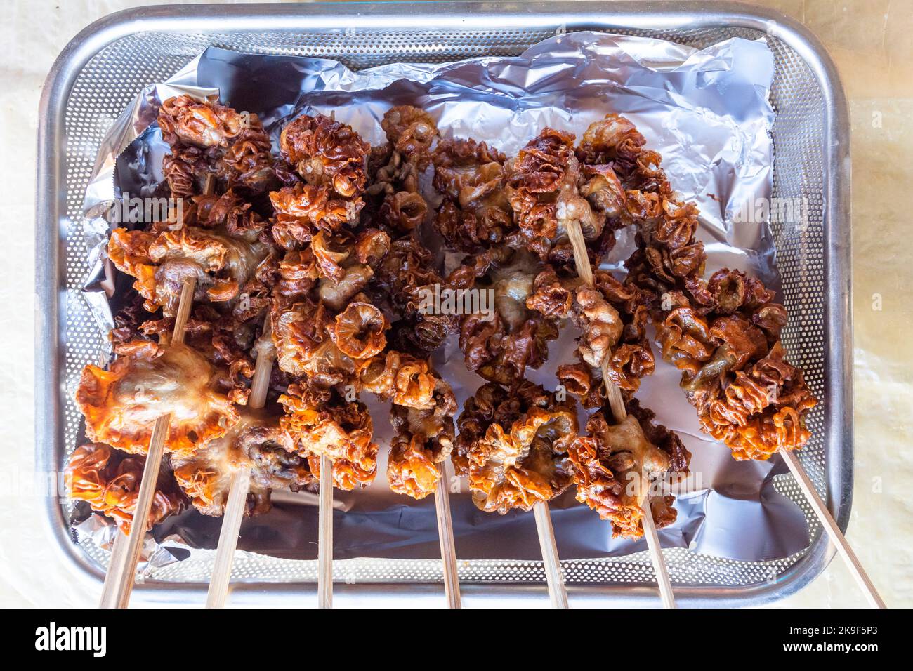 Deep fried pork intestinge locally called ginabot is a popular delicacy ...
