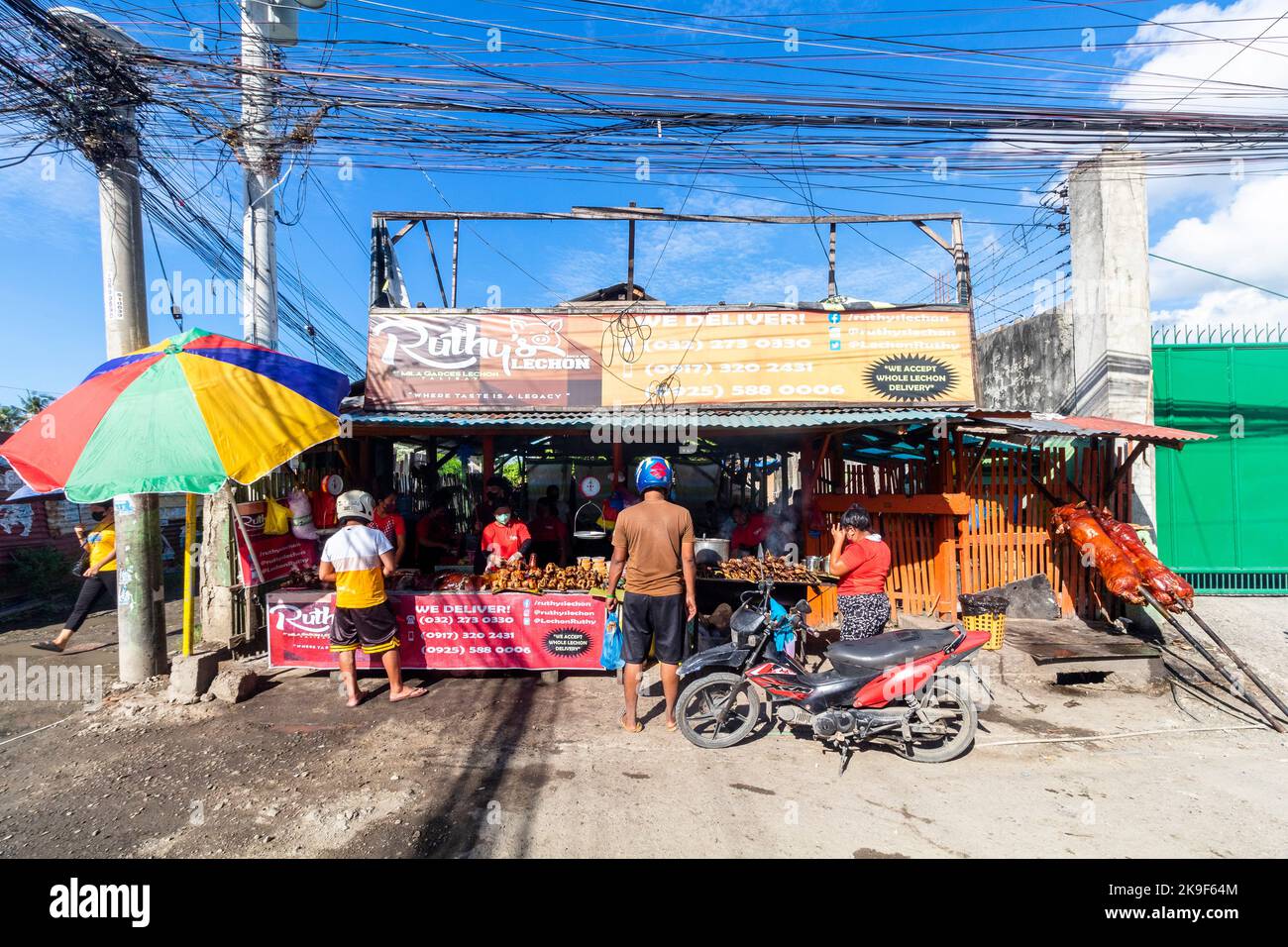Popular filipino lechon or roast pig sold at a Sunday market in Cebu ...
