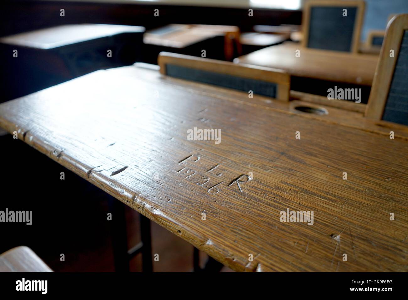 Old historical classroom with wooden desks and chalkboards Stock Photo ...