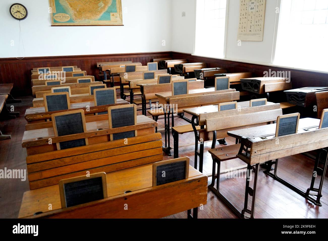 Old historical classroom with wooden desks and chalkboards Stock Photo ...