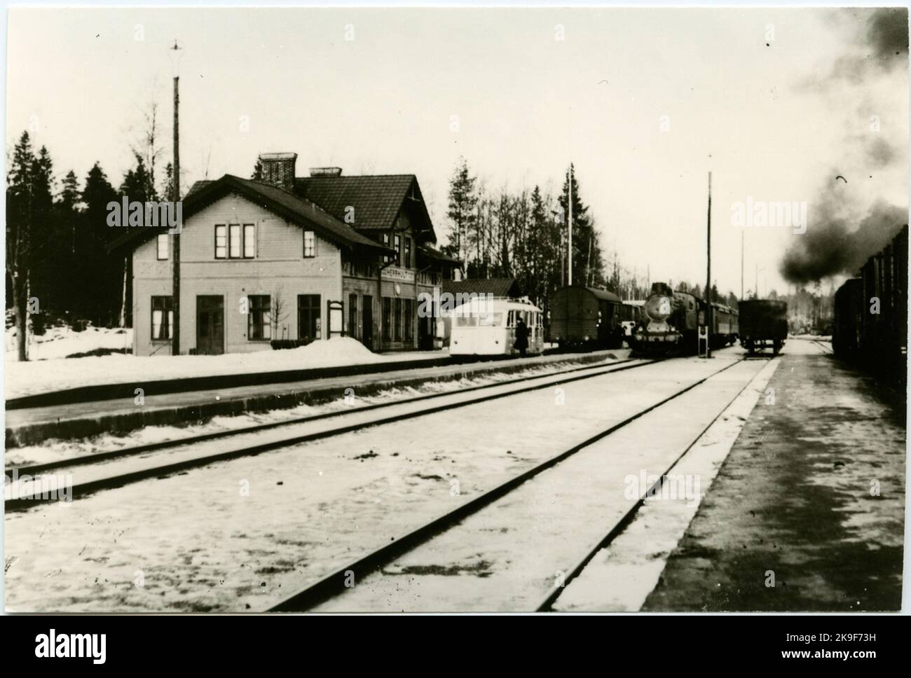 The station was opened in 1877. One-half-ward station house in wood ...