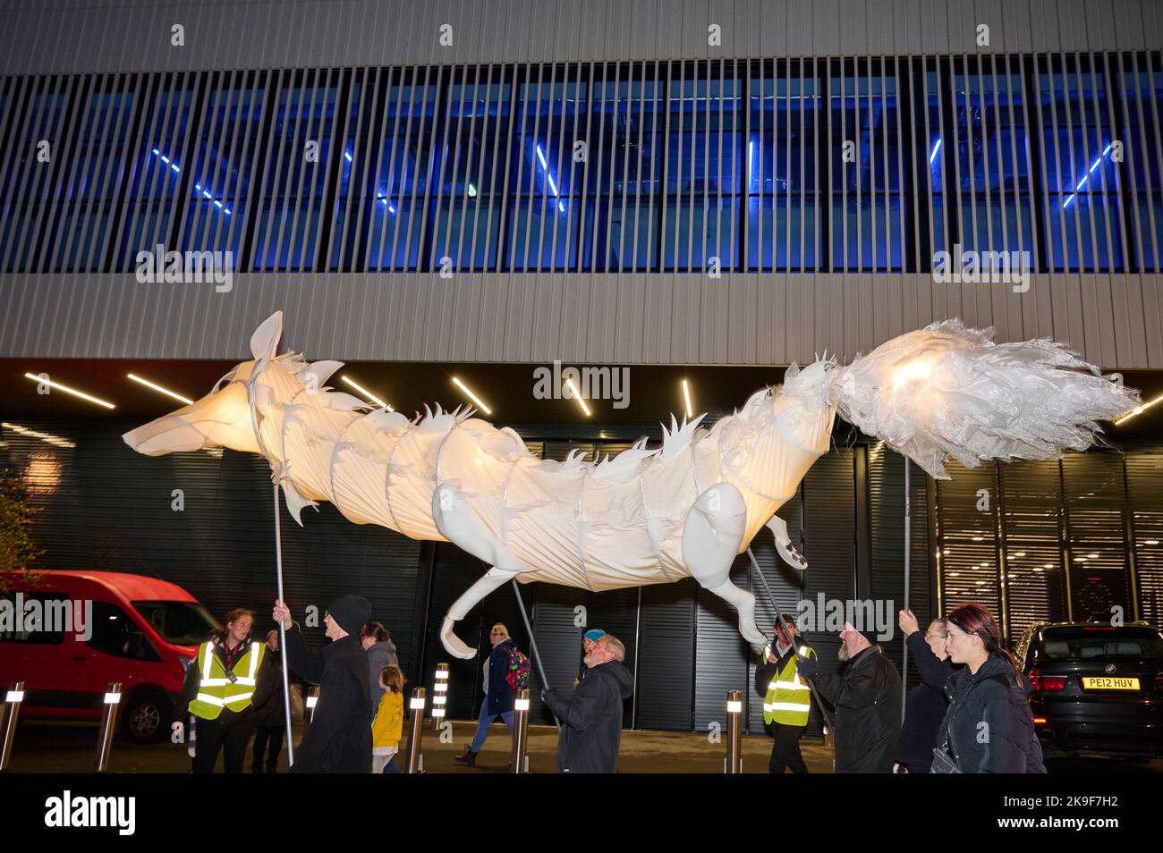 Blackpool Lightpool festival 2022. Illuminated white fox carried ...