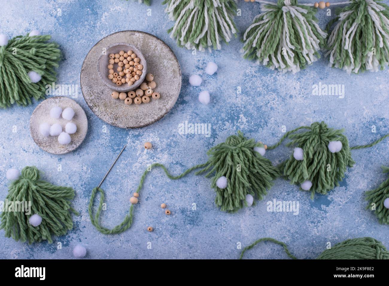Hand made Christmas boho style garland Stock Photo - Alamy