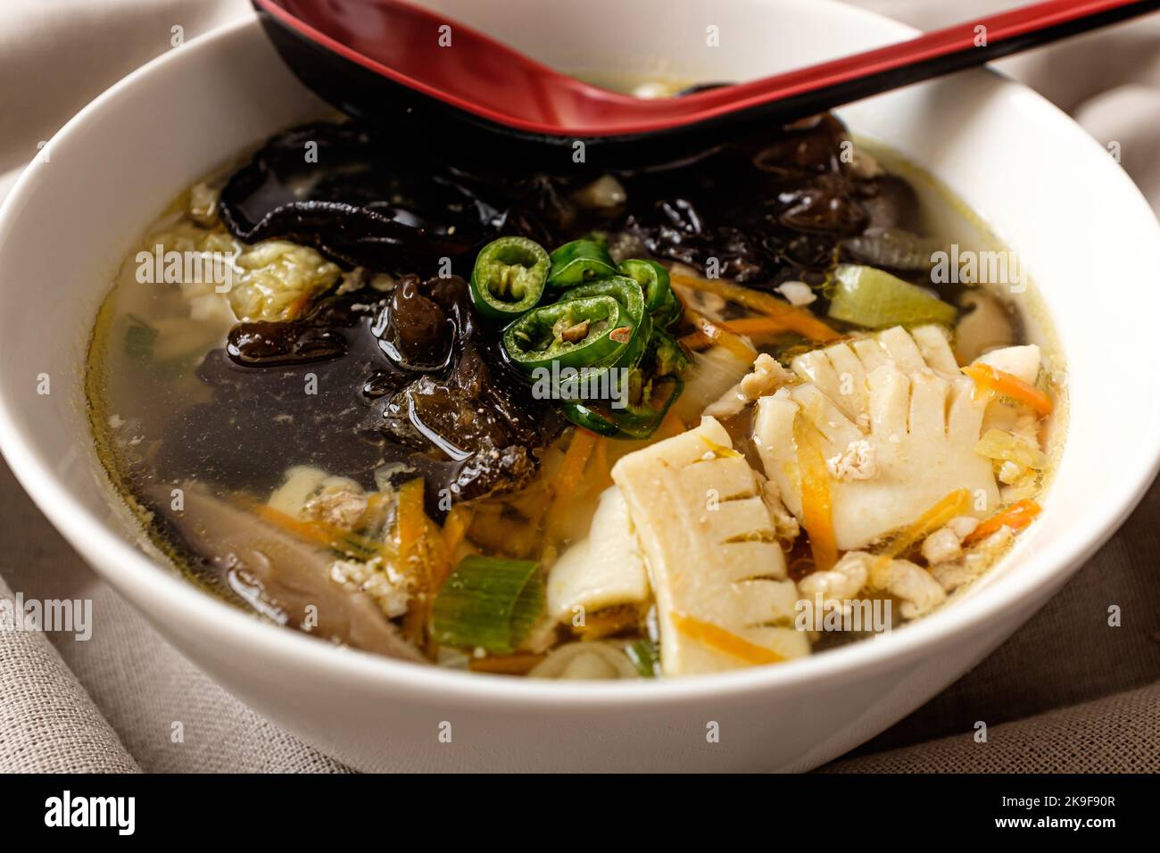 White Jjamppong Soup with Seafood and Vegetables Stock Photo - Alamy
