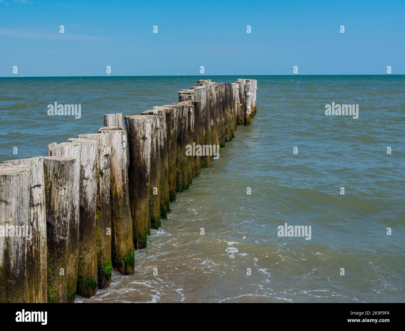 Breakwater on the beach in the sea Stock Photo - Alamy